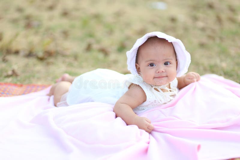 Thai Baby Smiling in the Evening the Playing Field. Stock Image - Image ...