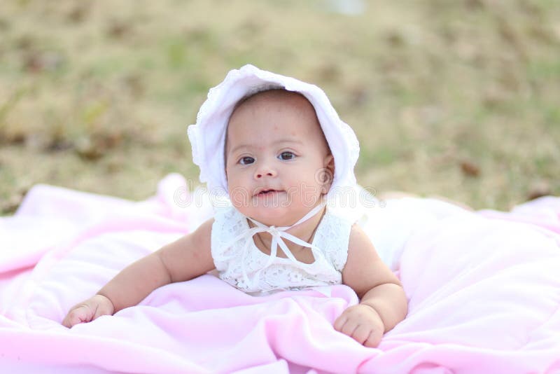 Thai Baby Smiling in the Evening the Playing Field. Stock Photo - Image ...