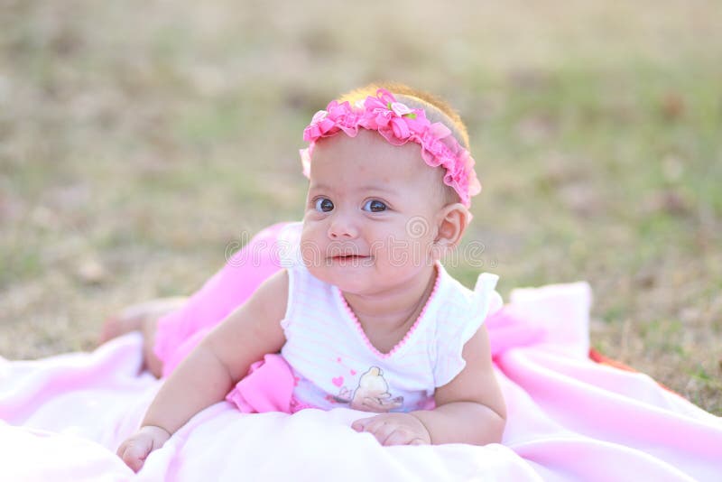 Thai Baby Smiling in the Evening the Playing Field. Stock Photo - Image ...