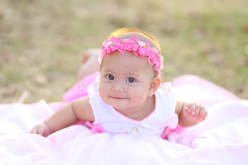 Thai Baby Smiling in the Evening the Playing Field. Stock Photo - Image ...
