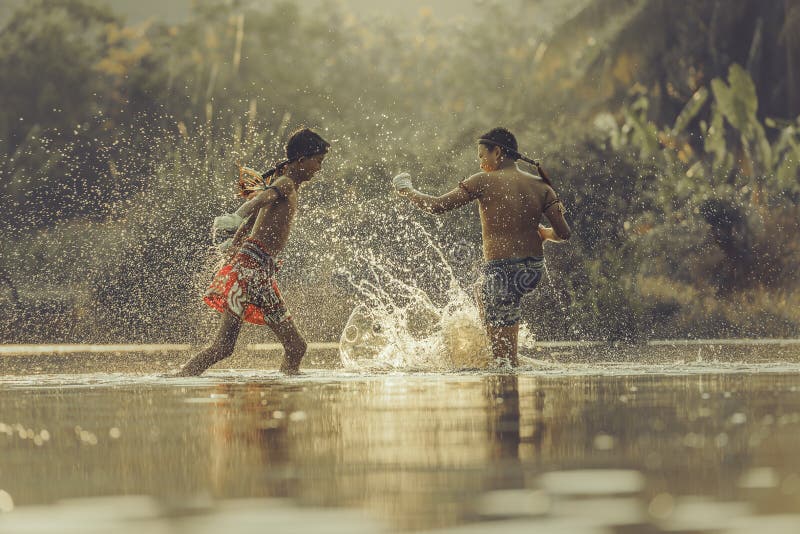 Thai Boxing,the Fighter Tying Tape Around His Hand Preparing To Fight ...