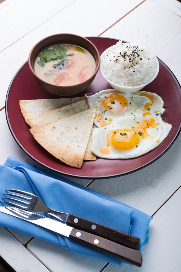 Asian Breakfast of Rice, Soup and Fried Eggs Stock Image - Image of ...