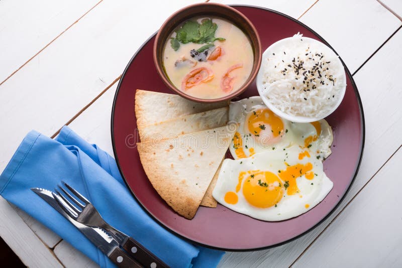 Asian Breakfast of Rice, Soup and Fried Eggs Stock Image - Image of ...