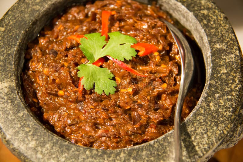 Thai Chilli Paste in Mortar Stone Stock Photo - Image of food, green ...