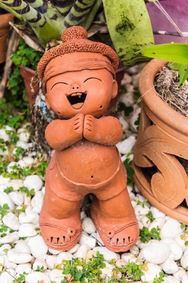 Thai clay boy Tribal stock image. Image of homemade, color - 44279325