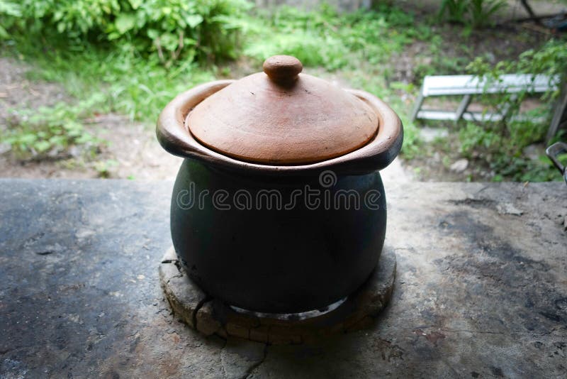 Thai clay pot on fire stock photo. Image of pottery, asia - 95429312