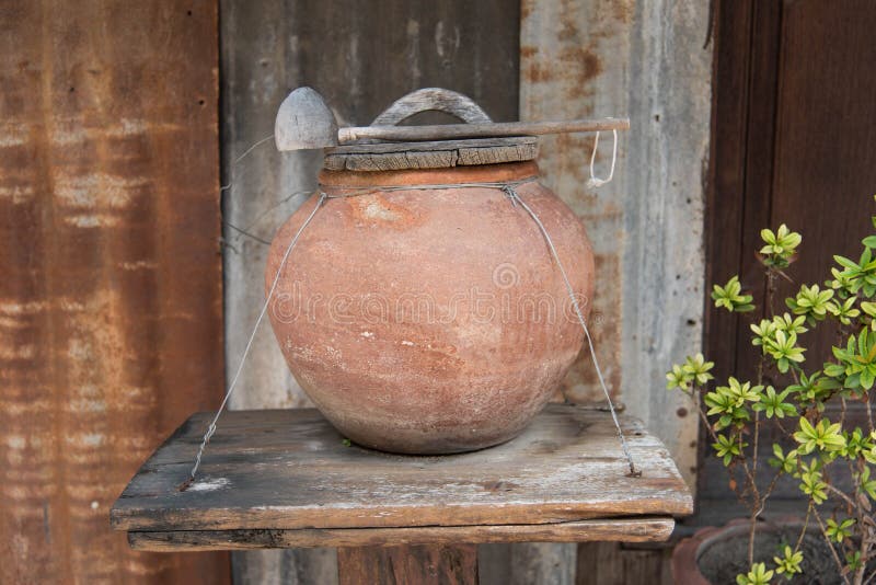 Thai Clay Water Pot with Dipper Made from Coconut Shell Stock Image ...