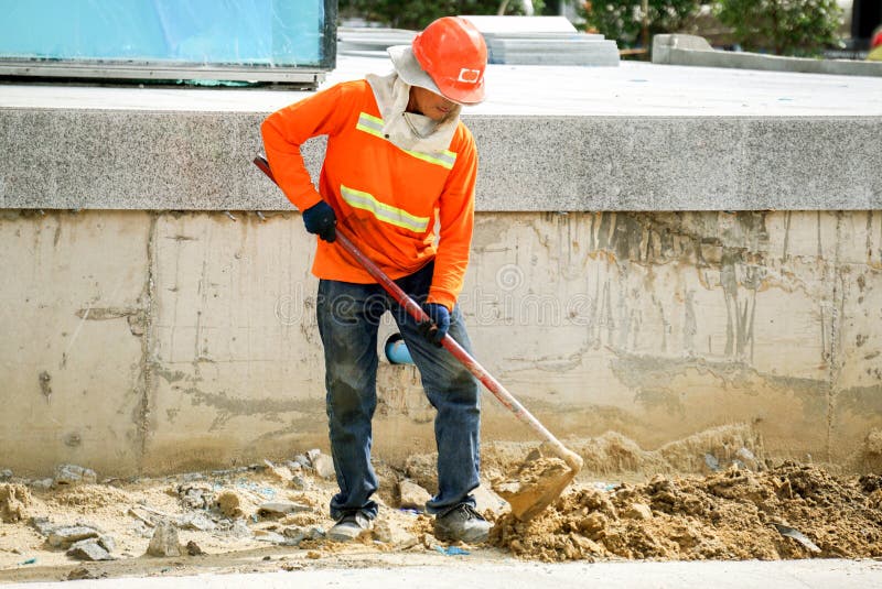 Thai Construction Worker are Preparing the Soil for Construction Work.l ...