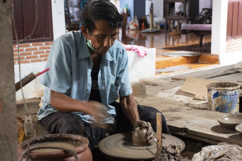 Thai Craftsmanship Technician or Professional Potter Use Machine Work ...