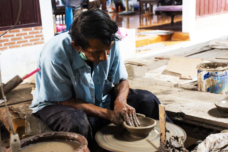 Thai Craftsmanship Technician or Professional Potter Use Machine Work ...