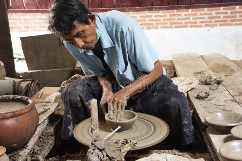 Thai Craftsmanship Technician or Professional Potter Use Machine Work ...