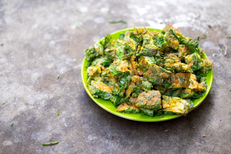 Thai Cuisine; Cha-om Omelet Stock Photo - Image of climbing, plate ...