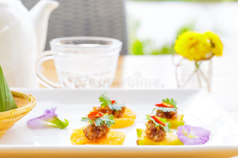 Thai Dessert Name is MA HOR on the Dish and they are on the Table Stock ...