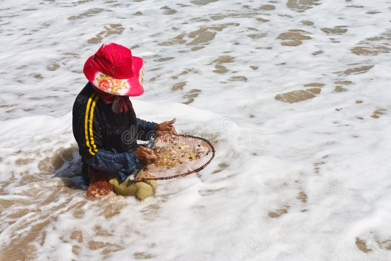 A Thai Fisherman is Searching for Shells Stock Image - Image of nature ...