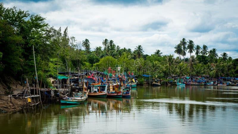 Thai Fishing Boats Tied Up To Each Other in the Harbor of Ben Krut ... Thai Fishing Boats Tied Up To Each Other in the Harbor of Ben Krut ...