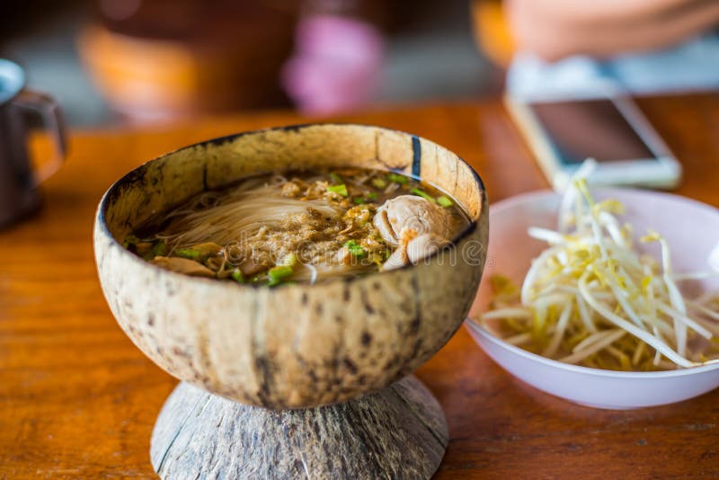 Thai Food Noodle in Coconut Shell Stock Photo - Image of basil, food ...