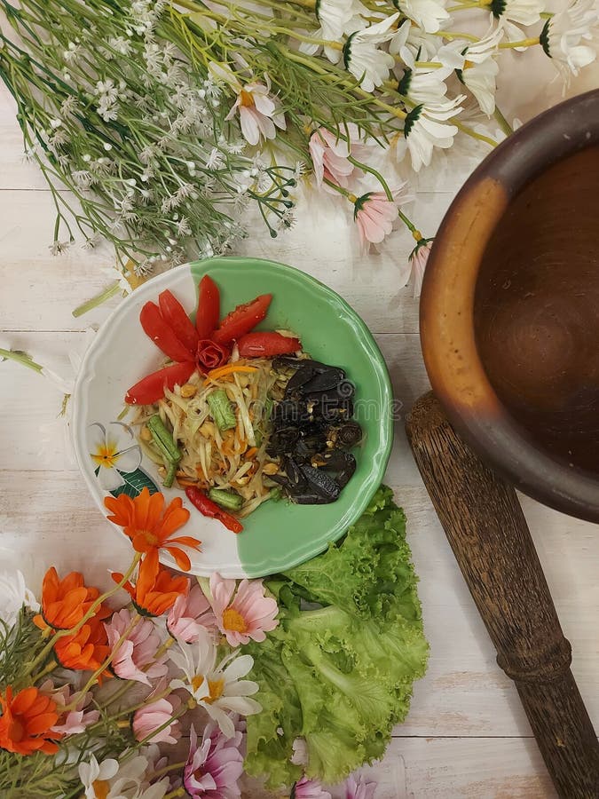 Thai Food is Spicy Salad with Papaya and Pickled Crab and a Mortar ... Thai Food is Spicy Salad with Papaya and Pickled Crab and a Mortar ...
