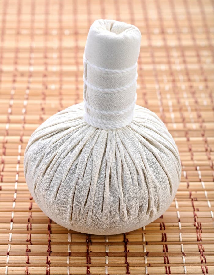 A Thai Herbal Poultice Rests on a Mat Stock Illustration - Illustration ...