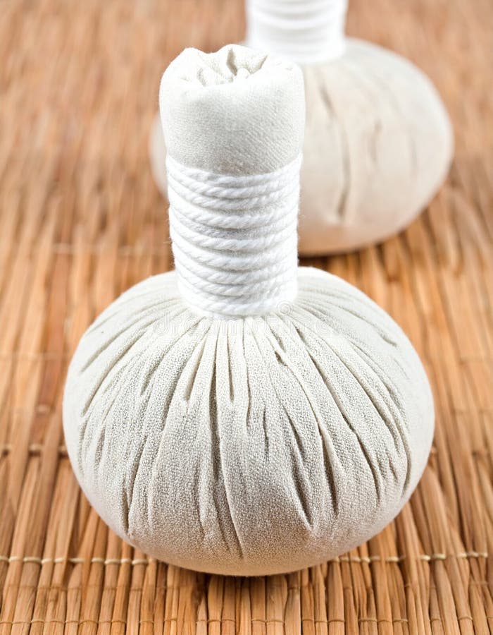 A Thai Herbal Poultice Rests on a Mat Stock Illustration - Illustration ...