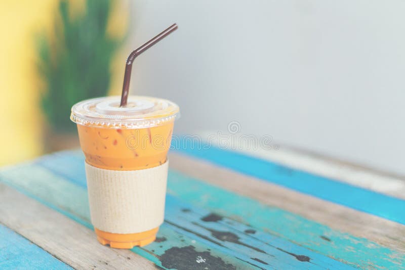 Thai Iced Tea in Plastic Glass for Take Home Put on the Vintage Stock ...