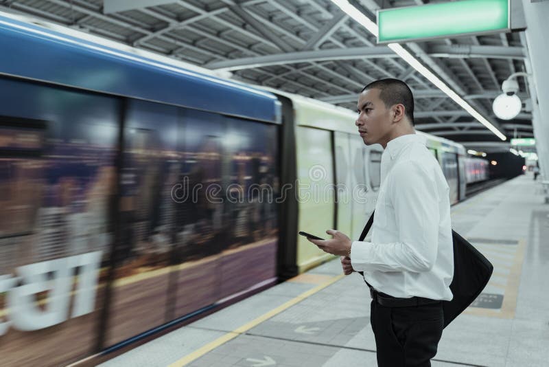 Thai Man Waiting for BTS Skytrain Stock Image - Image of motion, night ...