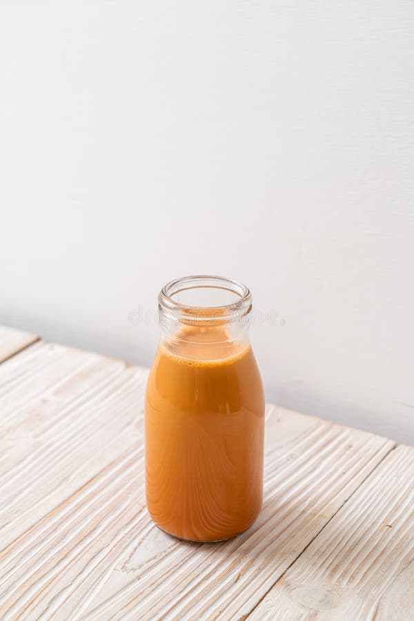 Thai milk tea in bottle stock photo. Image of green - 181129544