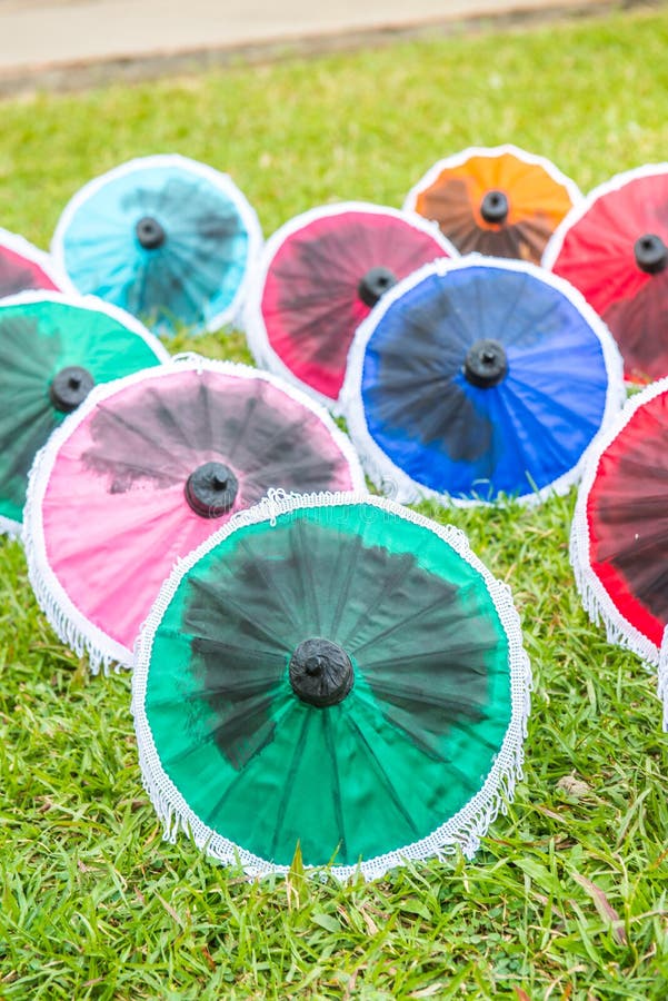 Thai Native Umbrella on Grass Stock Photo - Image of colorful, grass ...