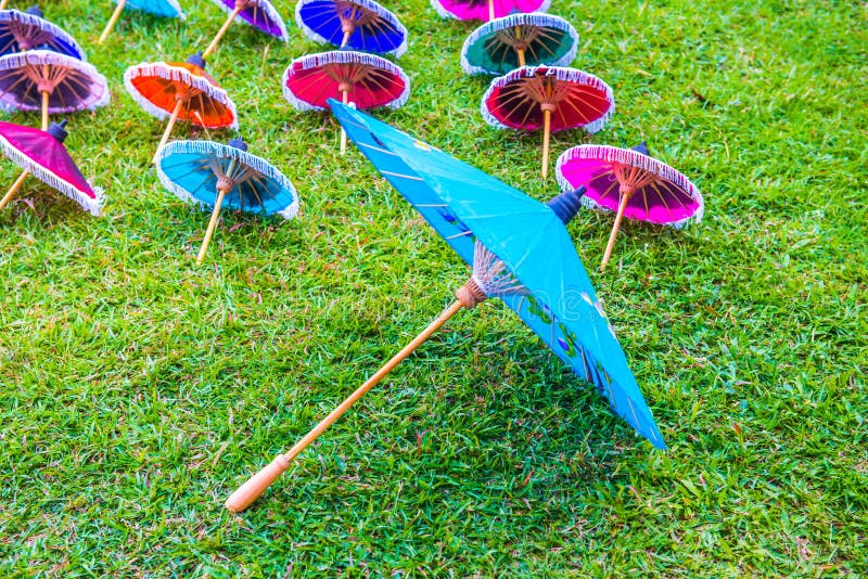 Thai Native Umbrella on Ground Stock Photo - Image of blue, native ...