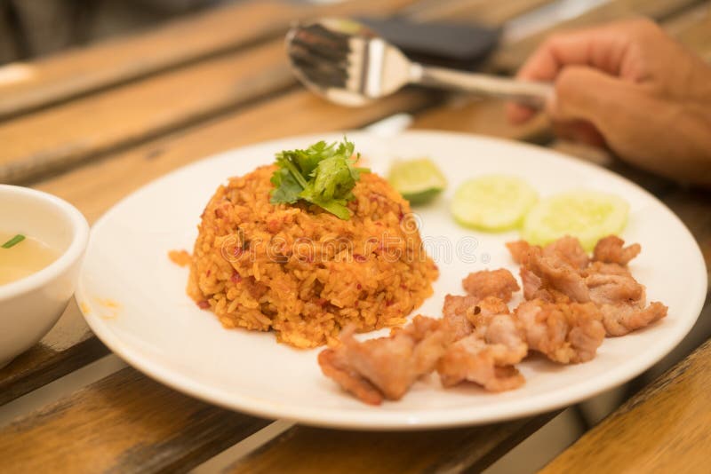 Thai Spicy Shrimp Paste Fried Rice Served with Fried Pork Stock Image ...