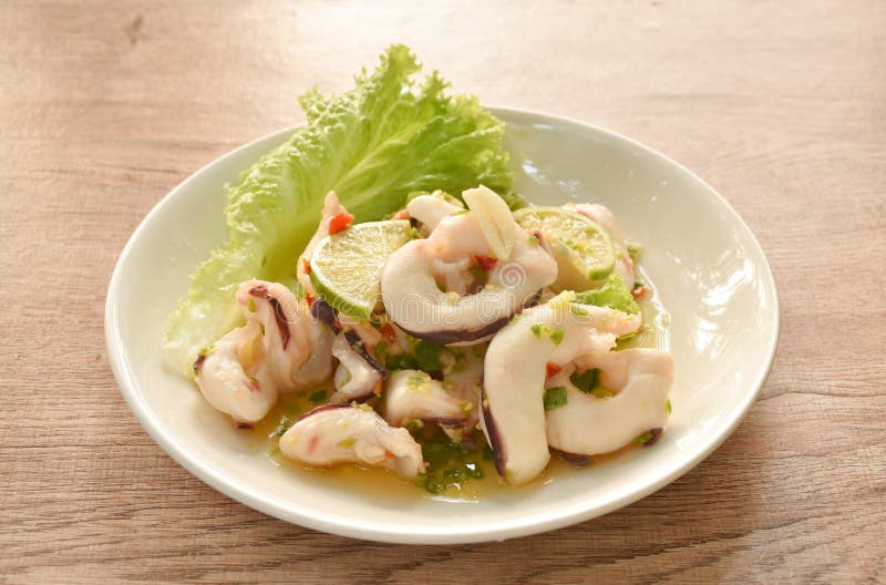 Thai Spicy and Sour Steamed Slice Squid with Lemon Salad on Plate Stock ...