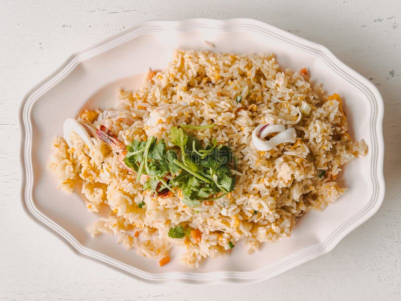 Thai Squid Fried Rice Served on White Dish Stock Image - Image of sauce ...