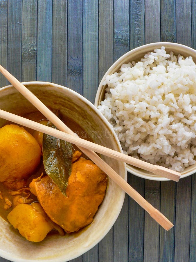 Thai-style Chicken Curry with Coconut Milk and Boiled Rice Stock Image ...