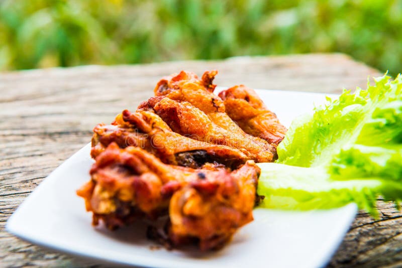 Thai Style Fried Chicken on Wooden Panel Stock Photo - Image of ...