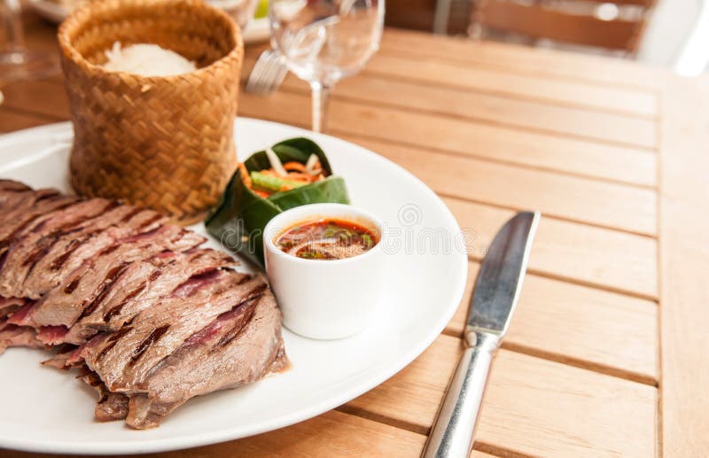 Thai Style Grilled Beef with Sticky Rice Stock Image - Image of ...