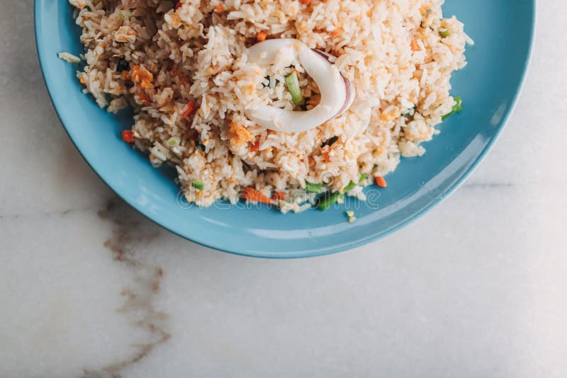 Thai Style Squid Fried Rice Served in Blue Ceramic Dish. Stock Photo ...