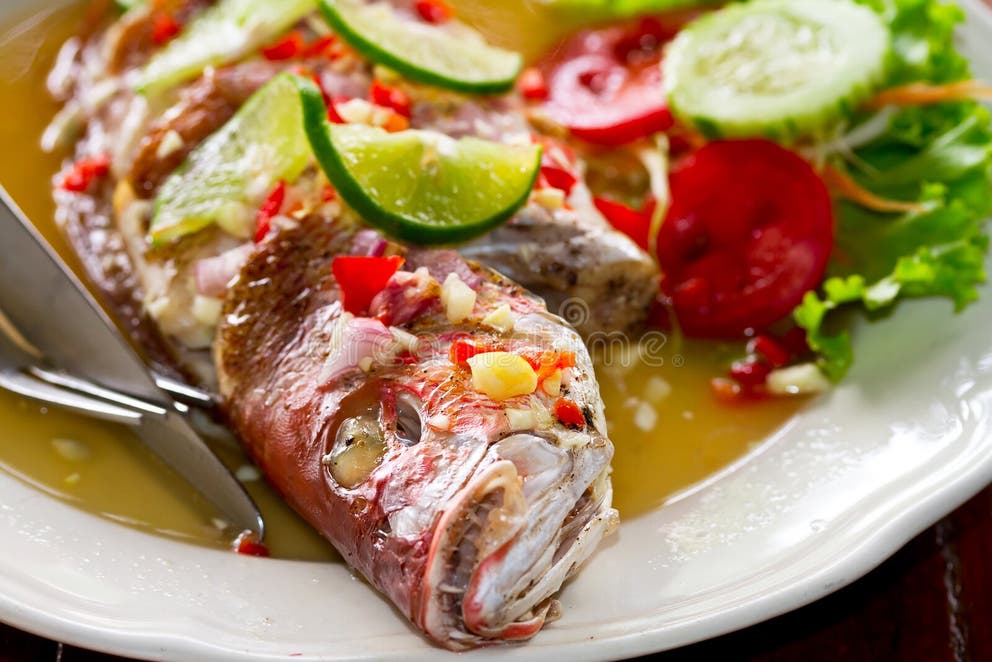 Thai Style Whole Red Snapper Fish Stock Image - Image of food, leaf ...