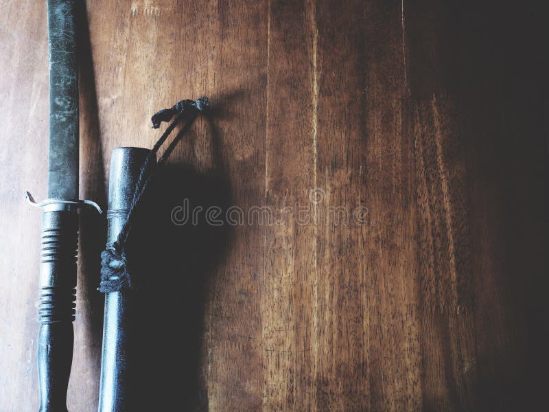 Thai sword on wooden table stock image. Image of history - 89740679