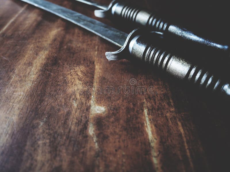 Thai sword on wooden table stock image. Image of traditional - 89740701