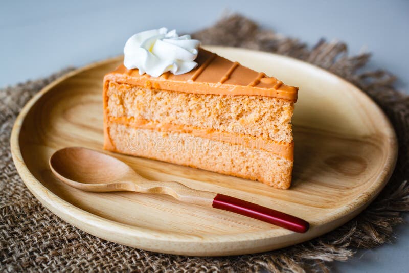 Thai Tea Layer Cake on Wood Plate. Stock Photo - Image of layer, fresh ...