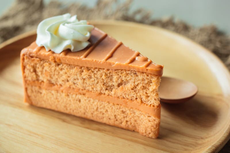 Thai Tea Layer Cake on Wood Plate. Stock Image - Image of dessert ...
