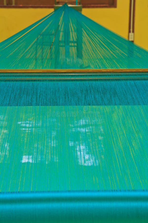 Thai woven silk machine stock photo. Image of material - 35434156