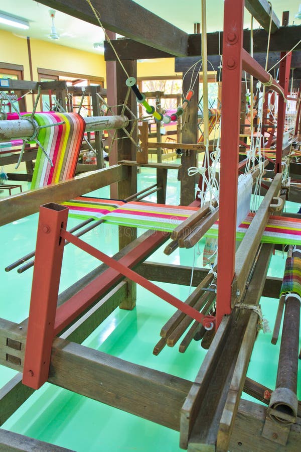 Thai woven silk machine stock photo. Image of material - 35435612