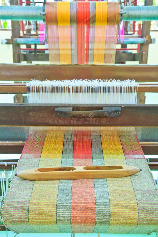 Thai woven silk machine stock photo. Image of green, fashion - 35436170