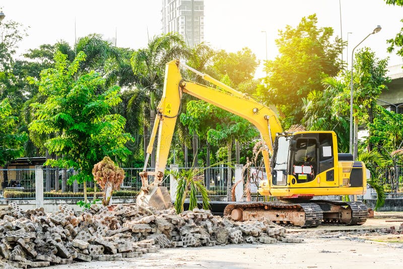 Modern Excavator Performs Excavation Work on the Construction Site ...