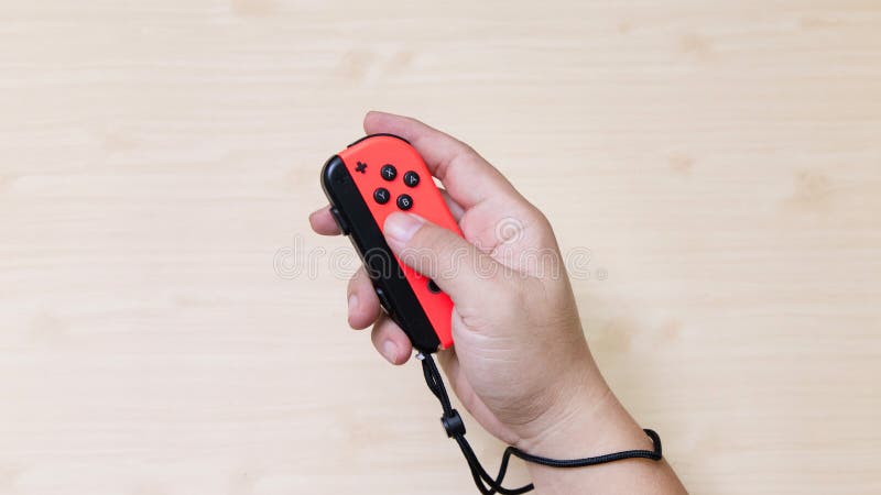 Thailand , Bangkok - MAY 7, 2018 Man Holding a Nintendo Switch G ...