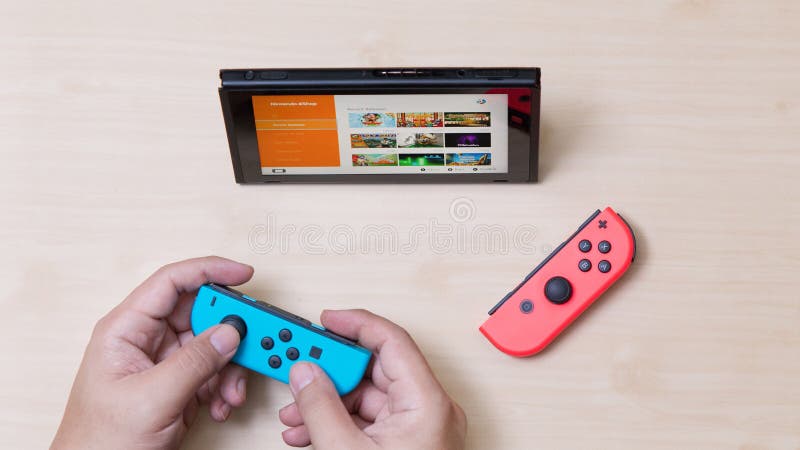 Thailand , Bangkok - MAY 7, 2018 Man Holding a Nintendo Switch G ...