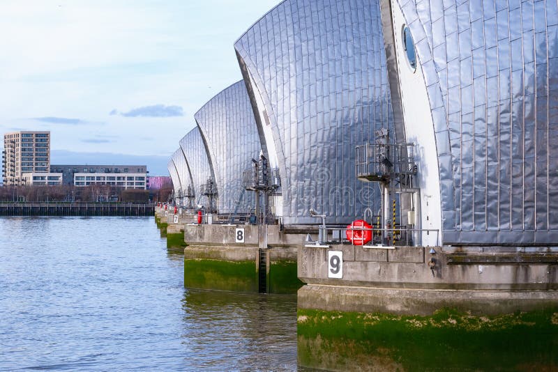 Thames Barrier with a Waterfront Apartment in the Background Stock ...