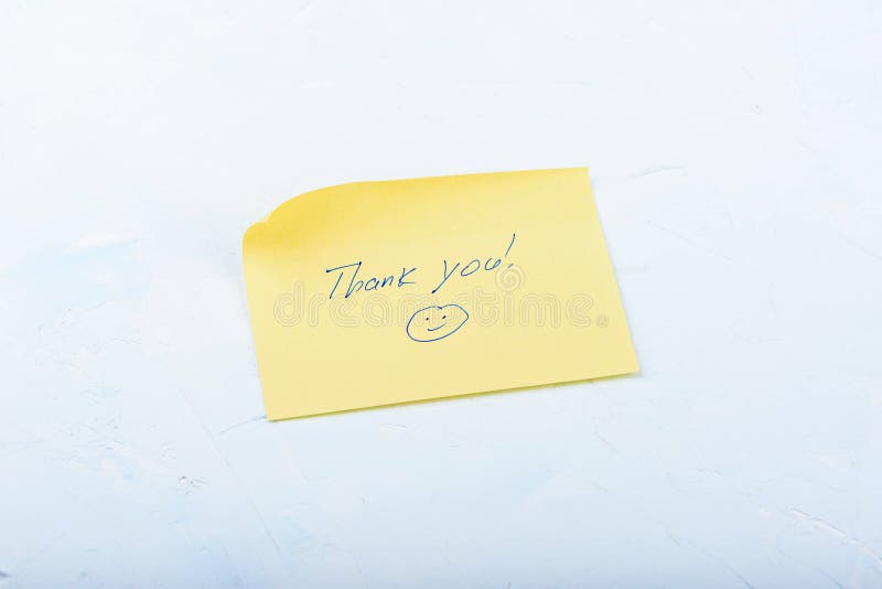 Thank You Note with a Happy Smiley Face on a Pale Blue Background ...