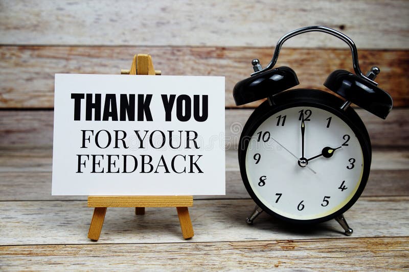 Thank You for Your Feedback Text Message on Paper Card with Wooden ...