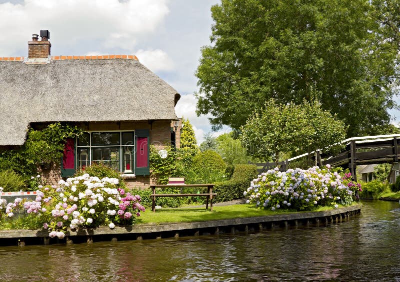 Thatched Farmhouse Near Canal Stock Image - Image of canal, village ...